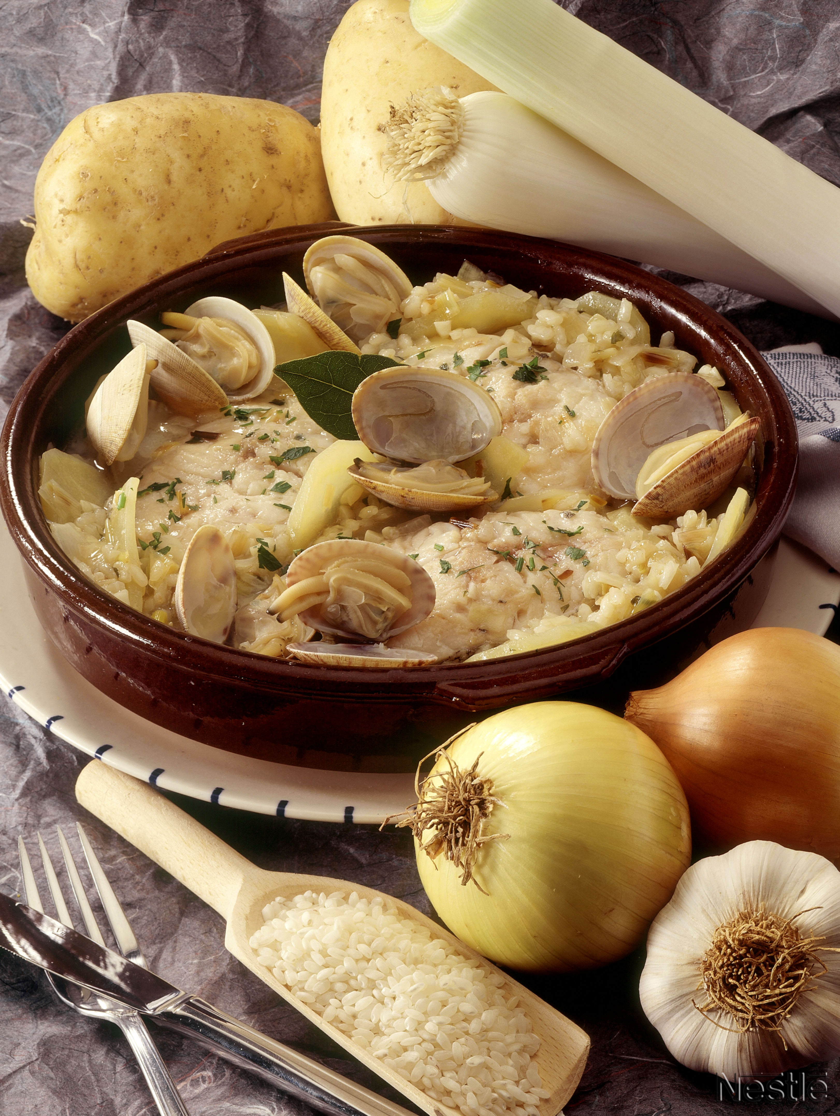 Arroz con merluza y almejas | Nestlé Cocina